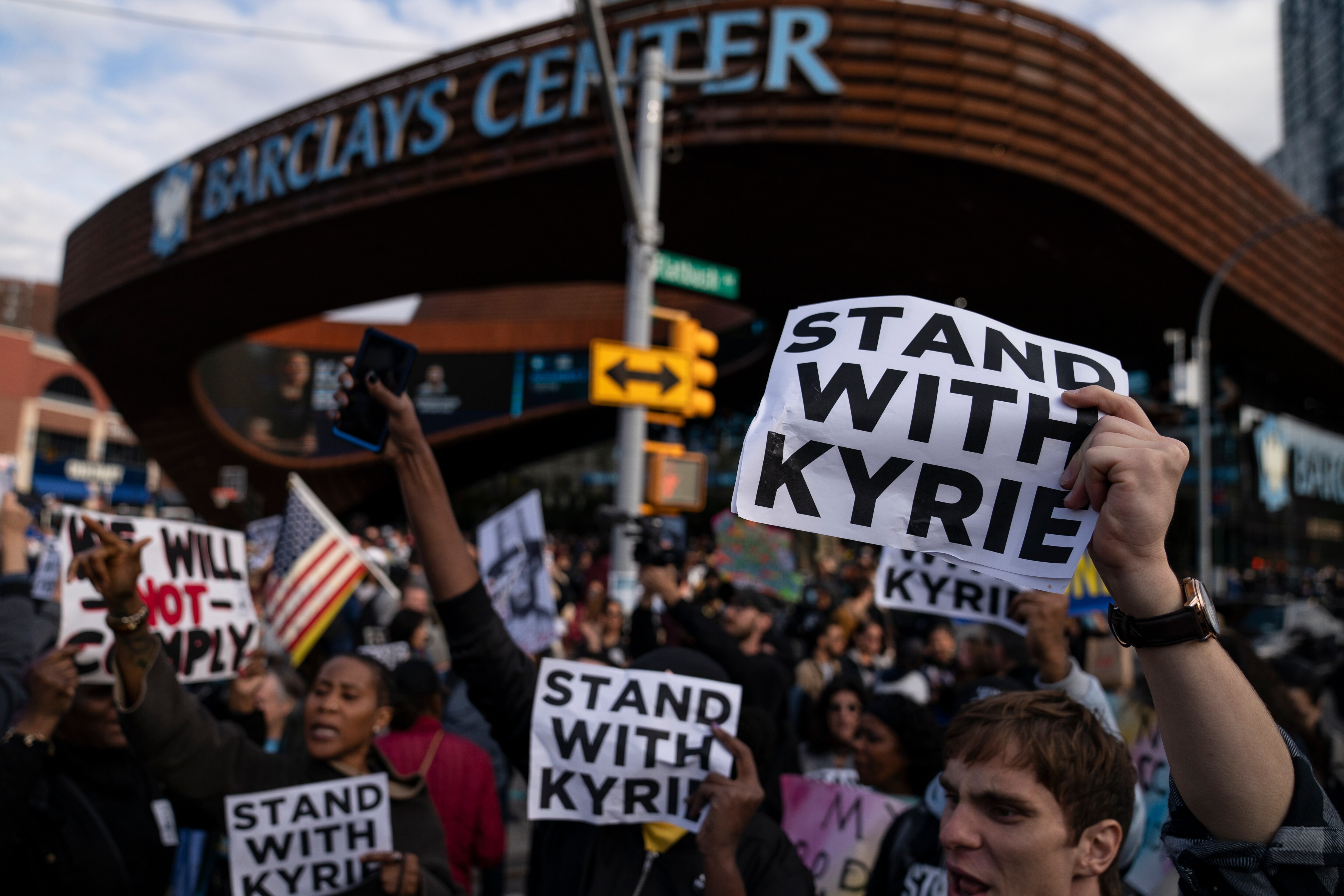 Kyrie Irving Shown Support by Vaccine Mandate Protesters Outside ...