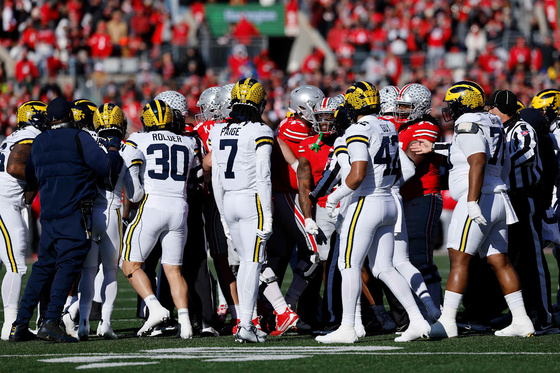 Video: Ohio State, Michigan Players Fight on Field After Wolverines' CFB Upset Win