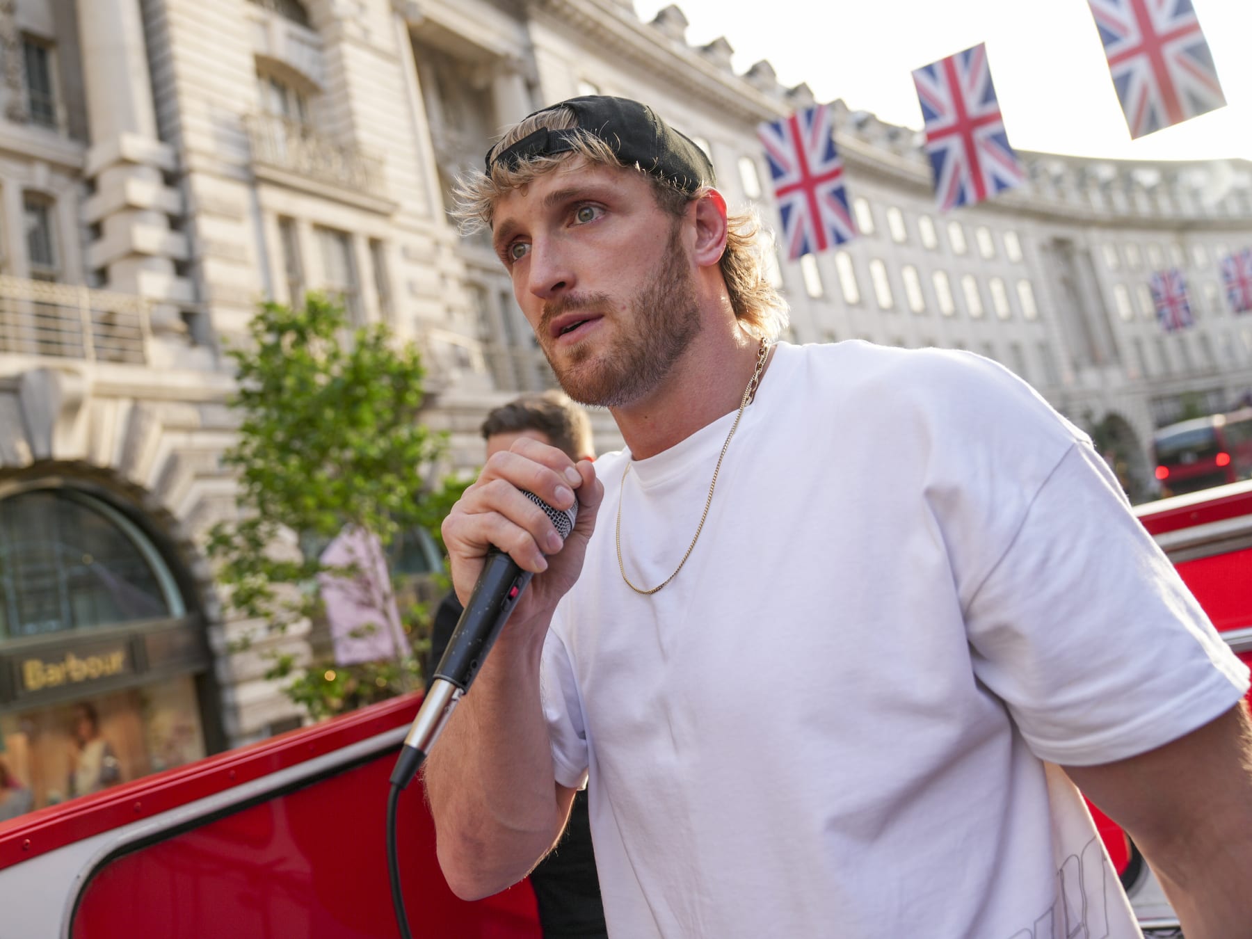 WWE Twitter Applauds Logan Paul's Performance vs. Roman Reigns at Crown ...