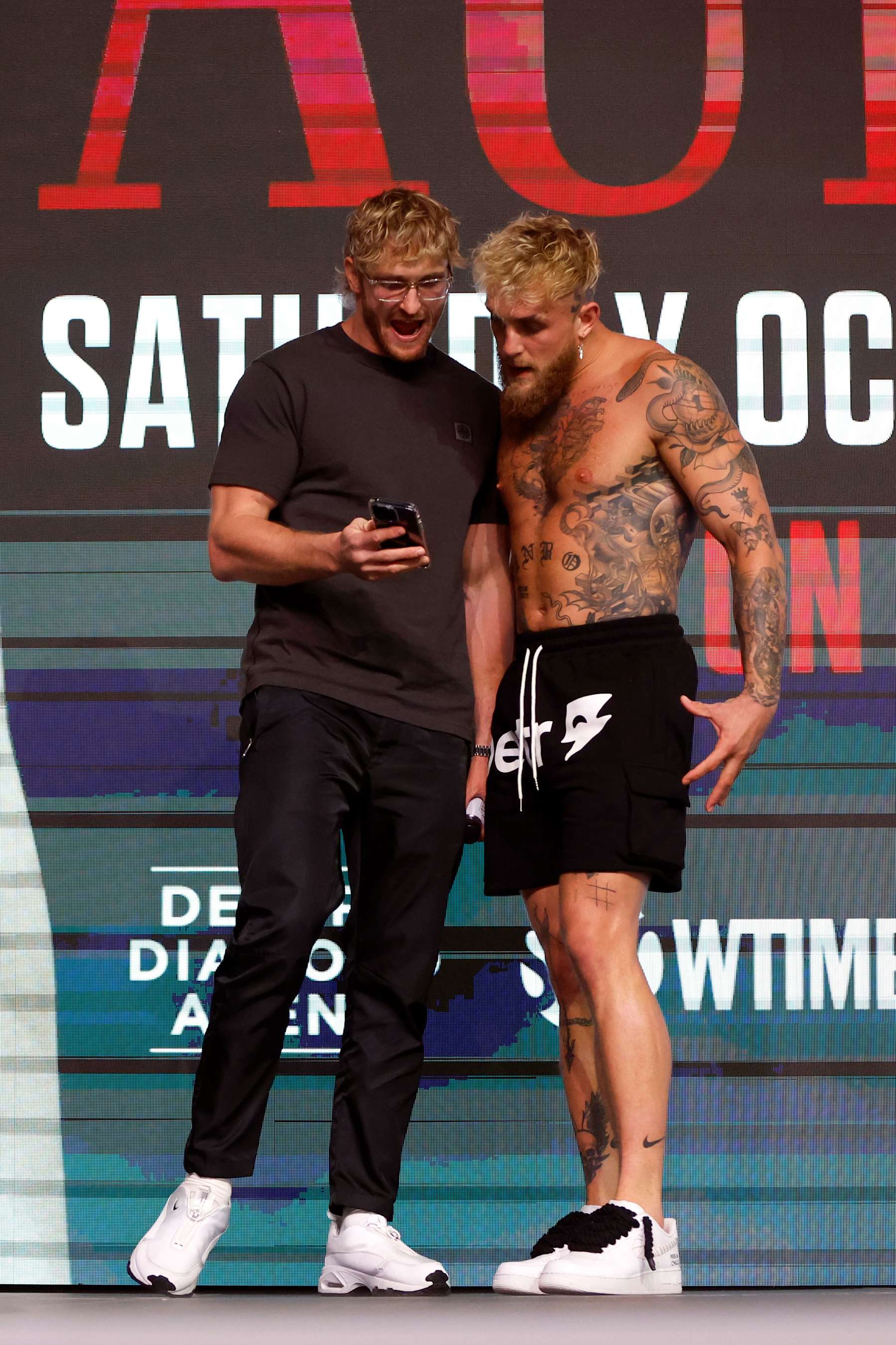 WWE's Logan Paul Reacts to 'F--king Iconic' Mike Tyson-Jake Paul Slap ...